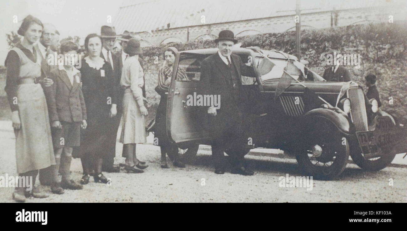 A photo of the Mayor of Clonmel wearing a bowler hat presenting a Ford ...