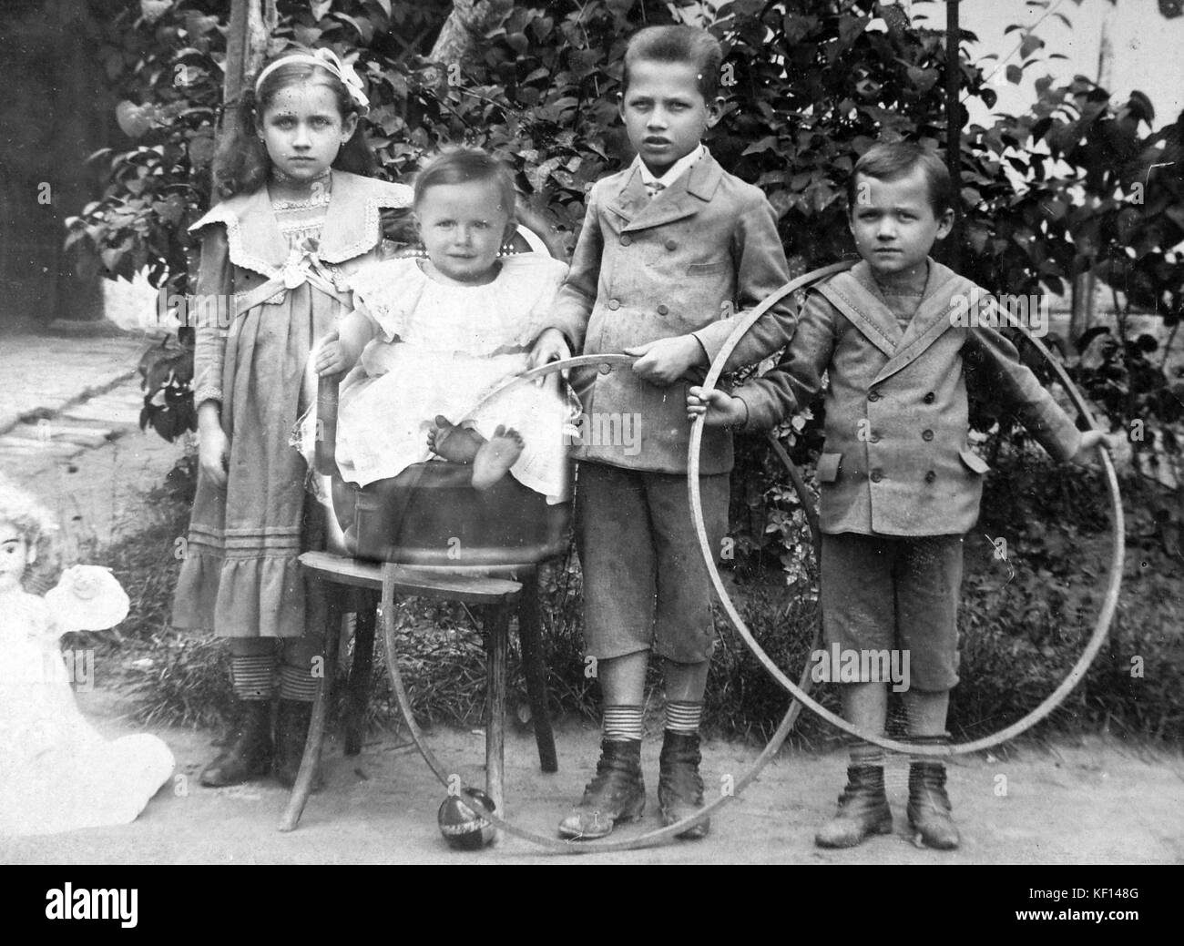 Kids, tableau, toy, doll, girls, garden, ball 11848 Stock Photo - Alamy