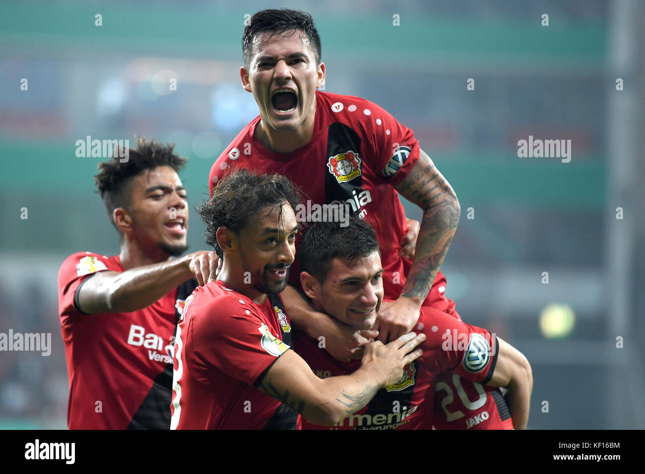 Leverkusen's Lucas Alario (2nd from right) celebrating his scoring the ...