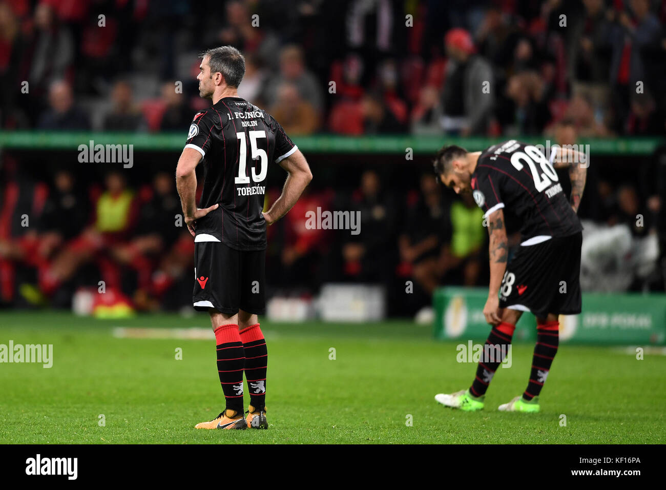 Berlin's Marc Torrejon (L) and Christopher Trimmel standing ...
