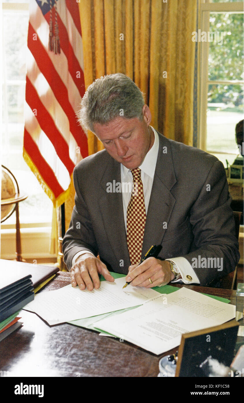 United States President Bill Clinton signs Executive Order No. 10163 in ...