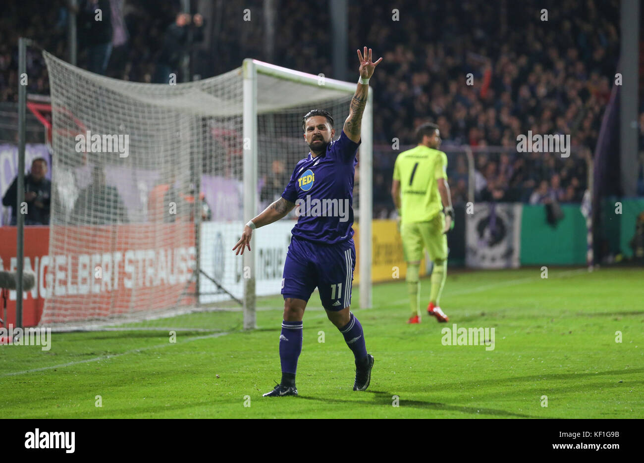 Osnabruck scorer Marcos Alvarez celebrating his scoring of the match's ...