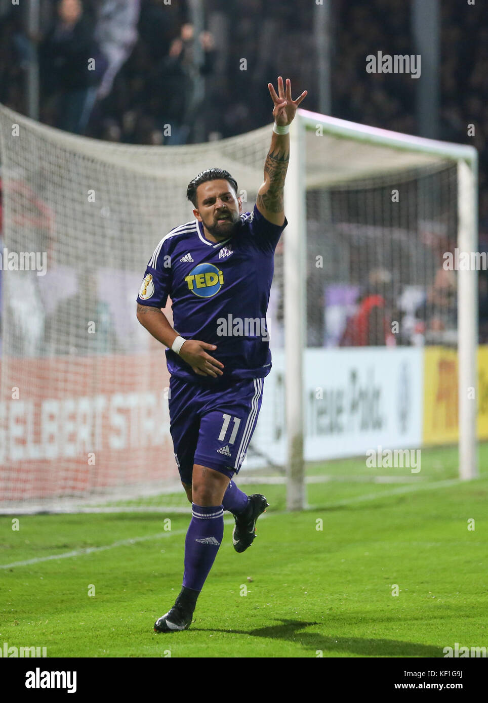 Osnabruck scorer Marcos Alvarez celebrating his scoring of the match's ...