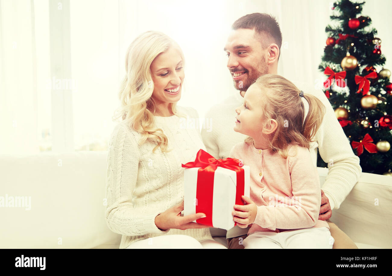 happy family at home with christmas gift box Stock Photo - Alamy