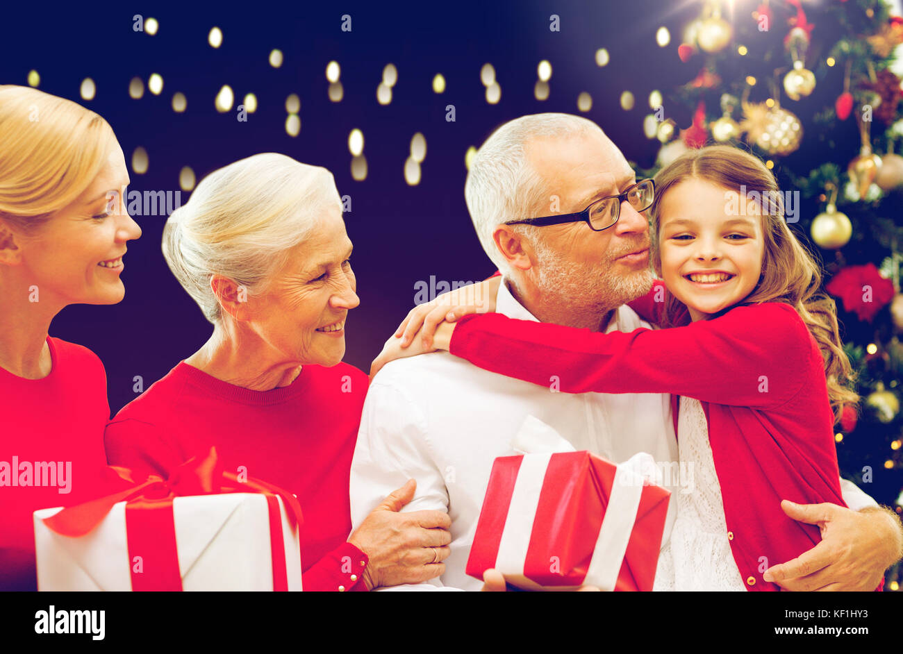 happy family with christmas gifts Stock Photo - Alamy