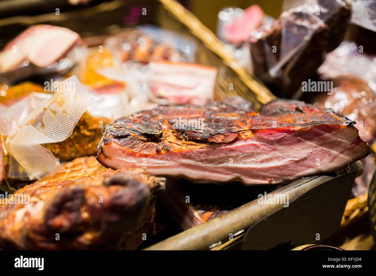 smoked meat products at market or butcher shop Stock Photo - Alamy
