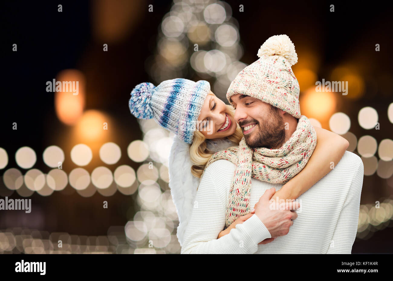 Woman happy hugging winter hi-res stock photography and images - Alamy