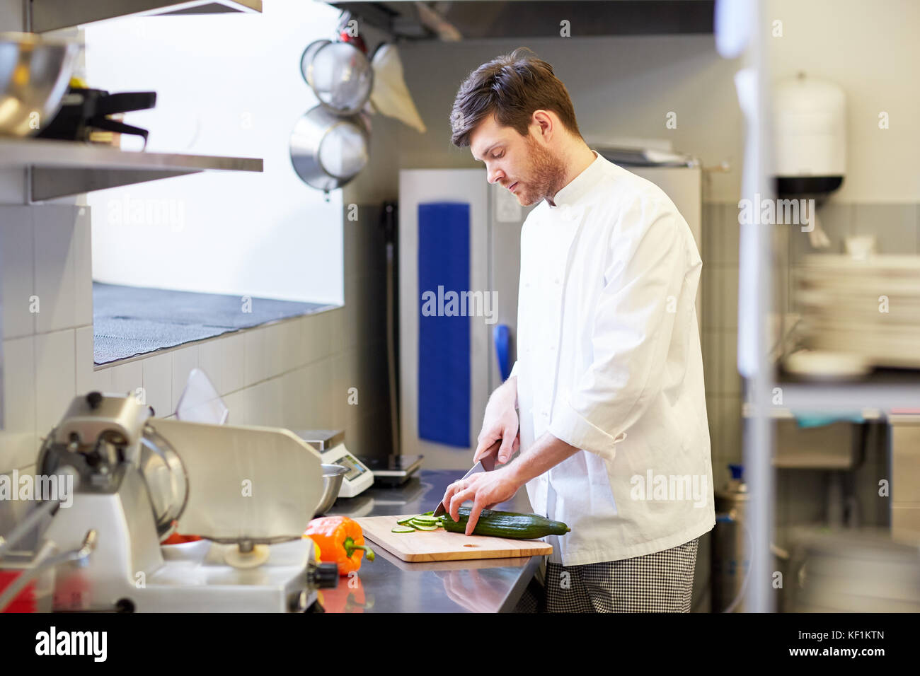 happy male chef cooking food at restaurant kitchen Stock Photo - Alamy