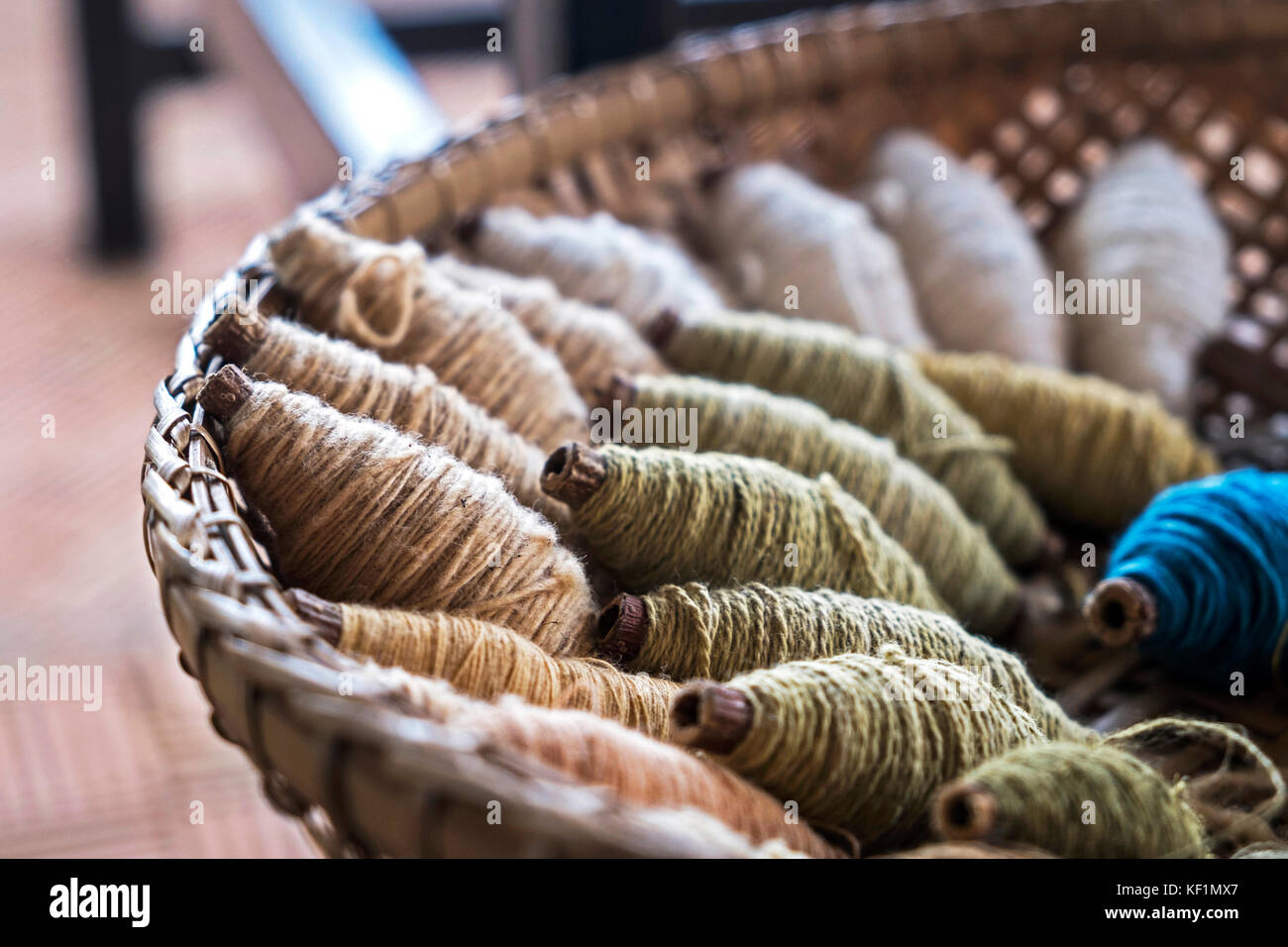 Cotton thread rolls in the threshing basket Stock Photo - Alamy