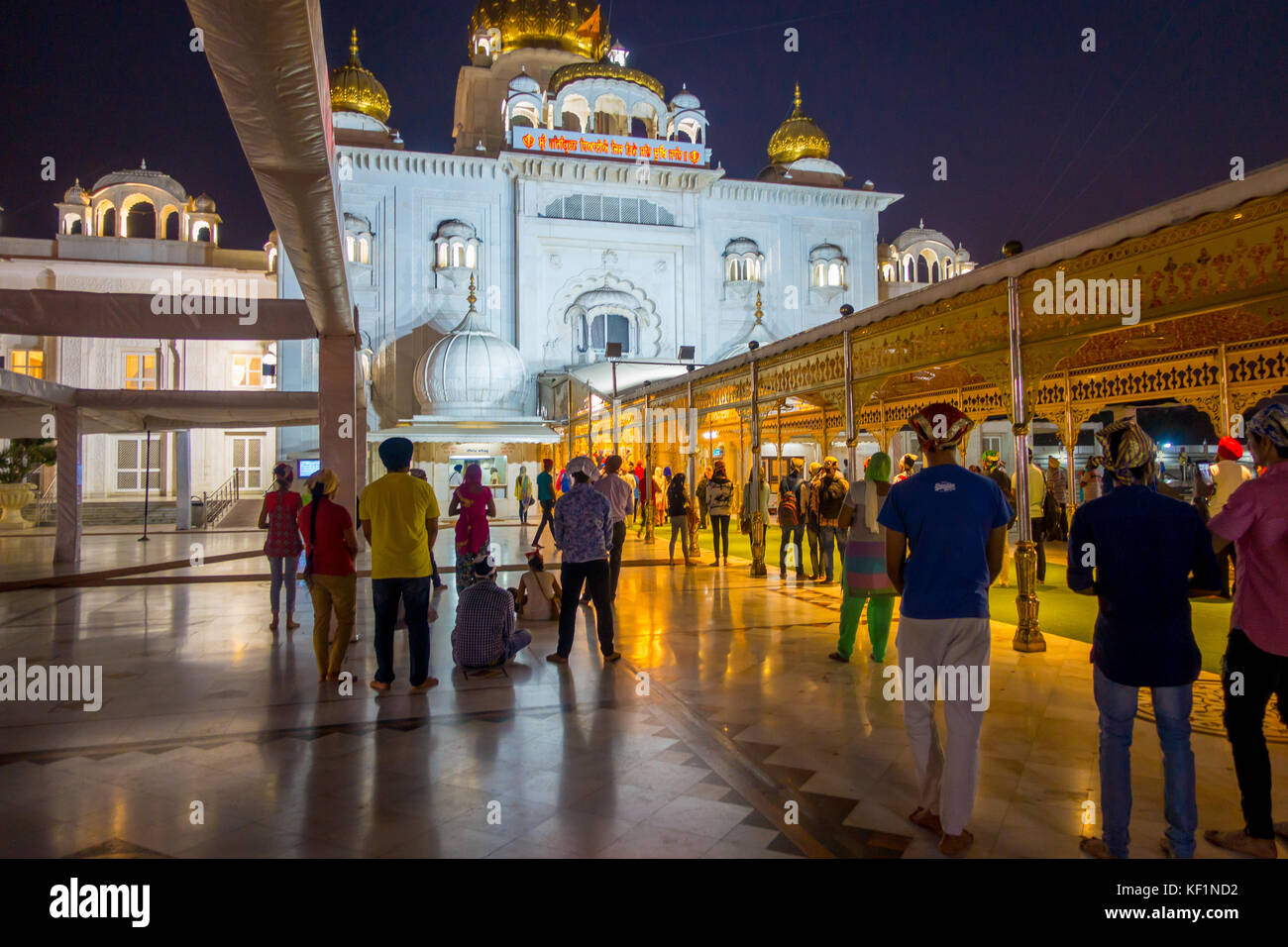 DELHI, INDIA - SEPTEMBER 19, 2017: Crowd of people walking in the plaza ...