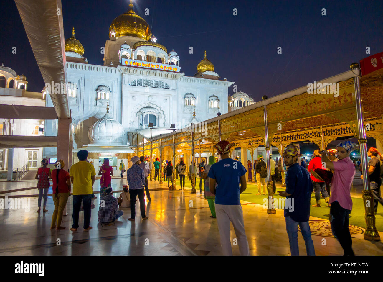 DELHI, INDIA - SEPTEMBER 19, 2017: Crowd of people walking in the plaza ...