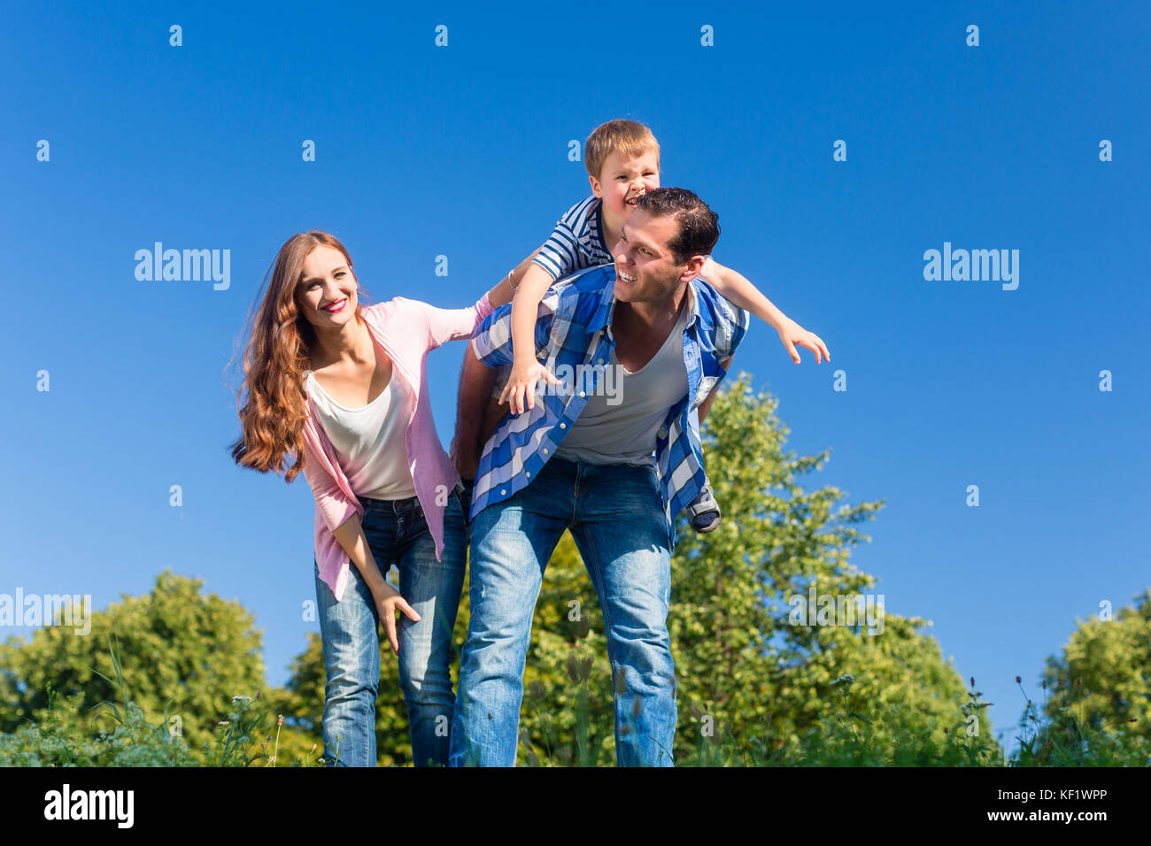Man carrying woman on back hi-res stock photography and images - Alamy