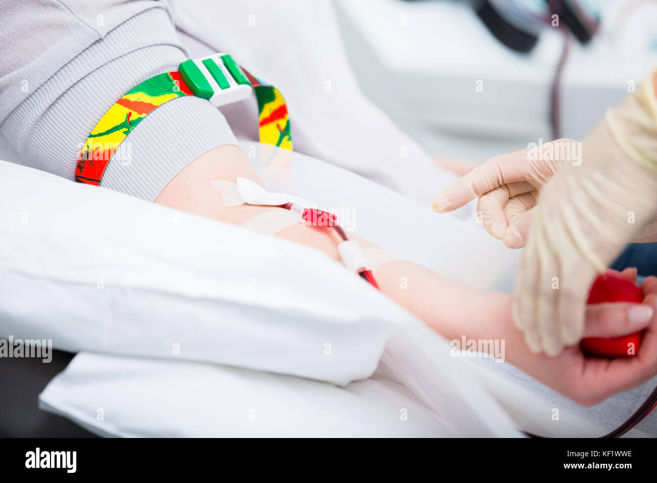 Blood running through vein catheter during blood donation Stock Photo ...
