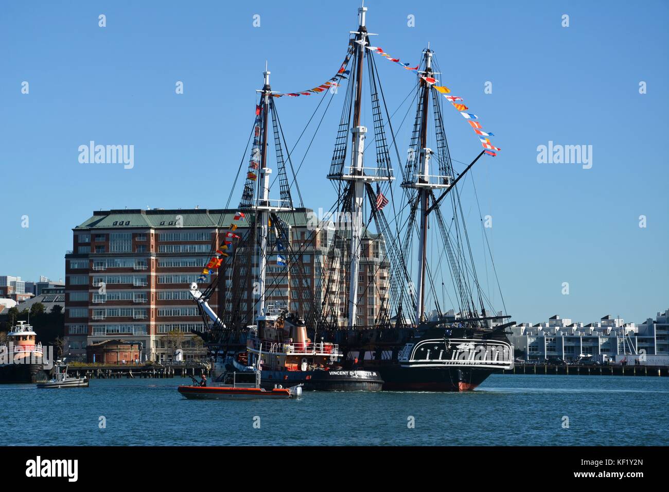 The historic USS Constitution sailing in Boston Harbor after a series ...