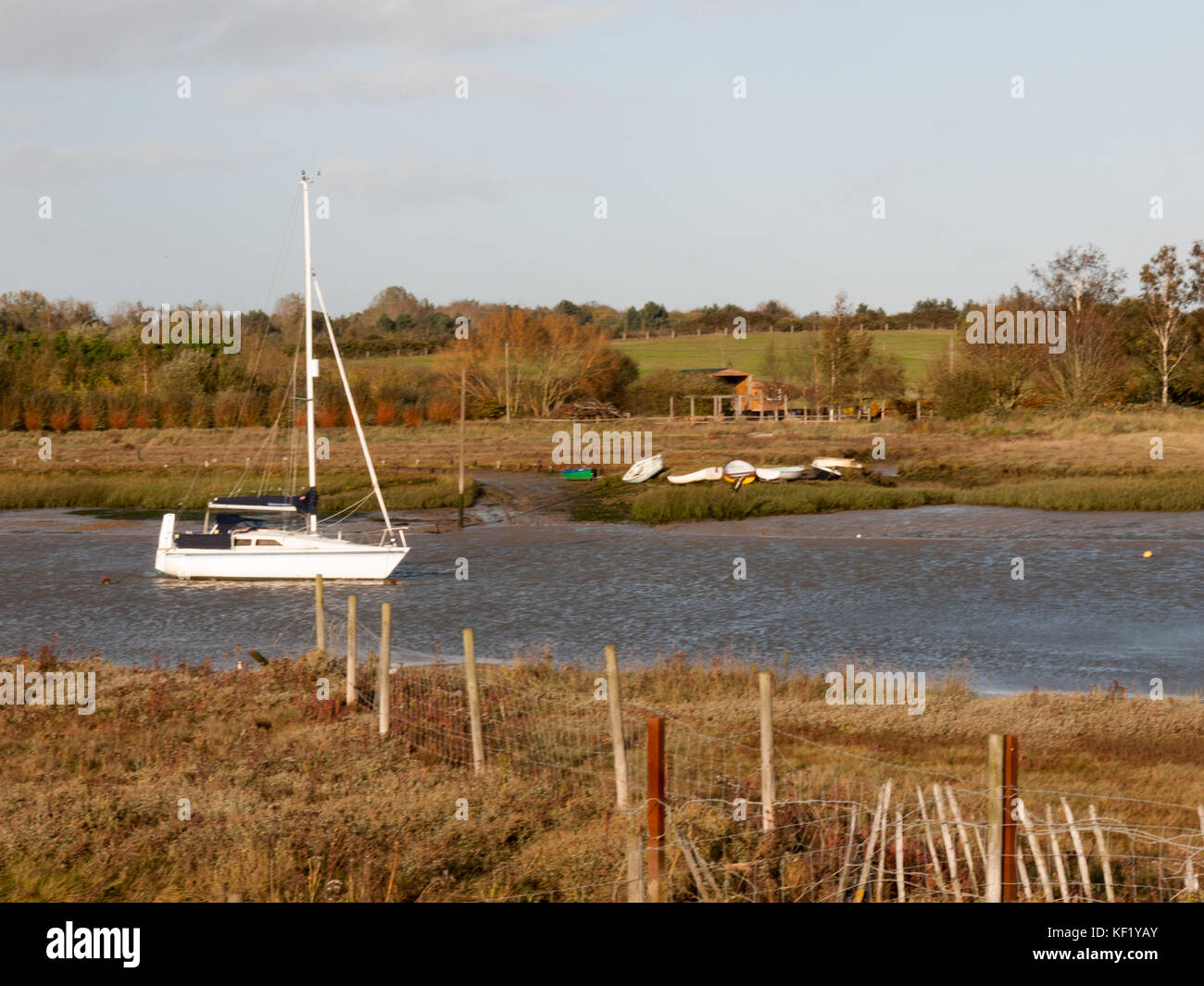 soft light harbor scene private boats parked in estuary; essex; england ...