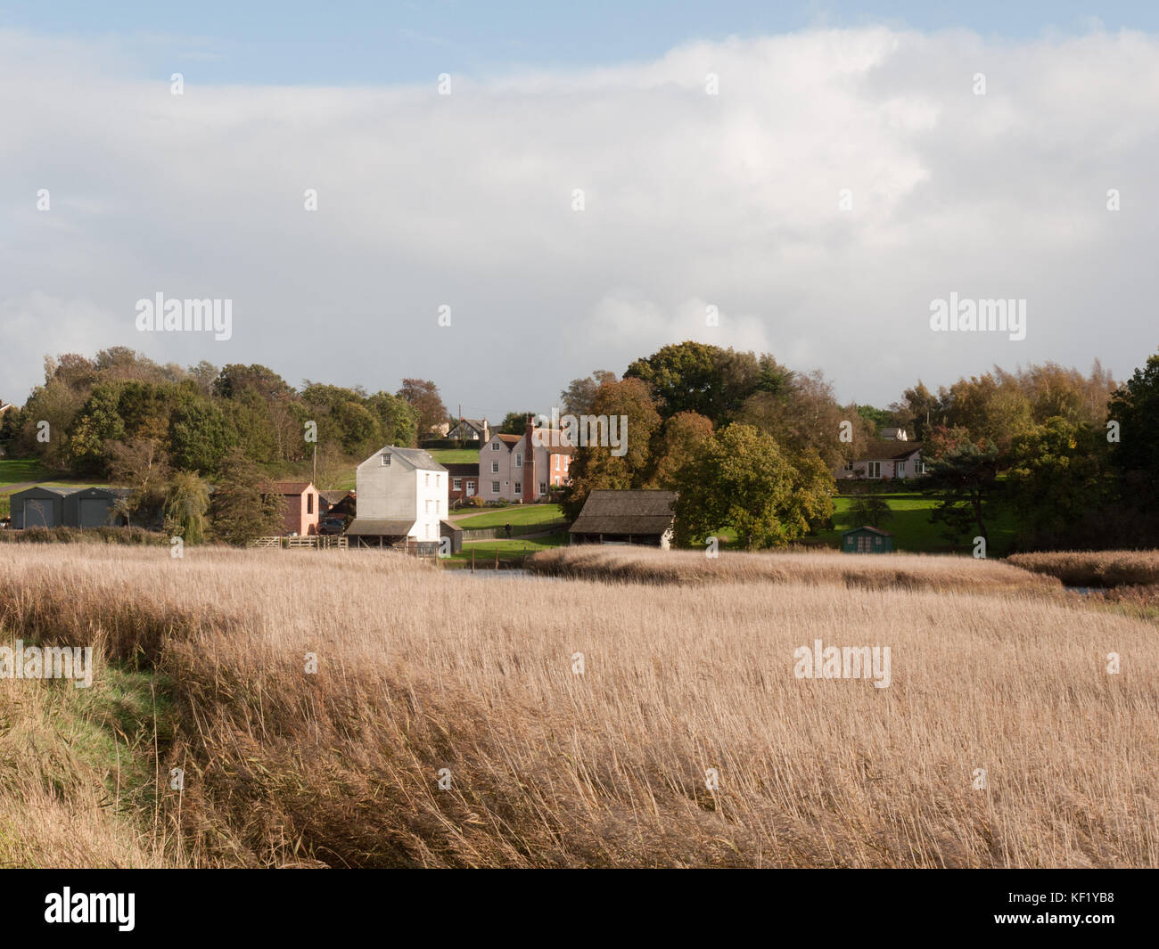 beautiful white mill old building end of coastal river; essex; england ...