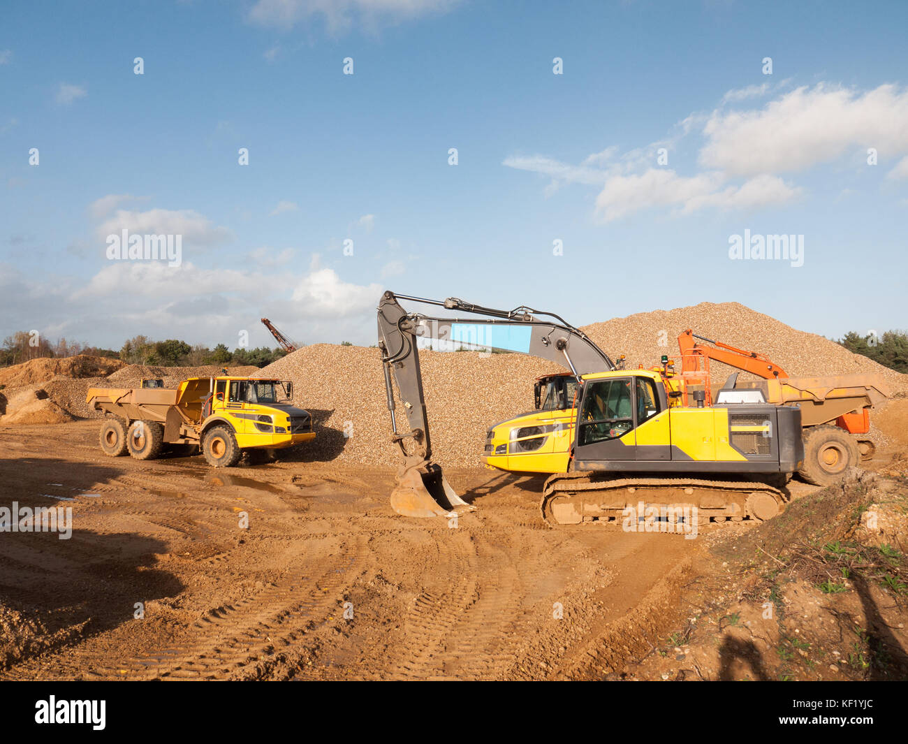 two parked vehicles industry construction quarry truck and digger ...