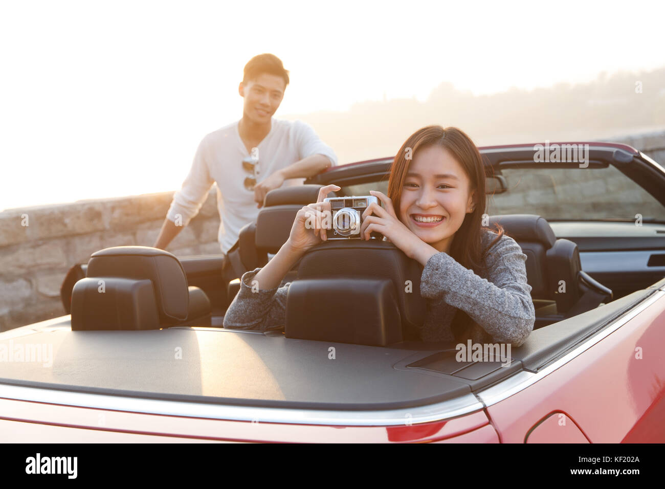 Asian couple sports car hi-res stock photography and images - Alamy