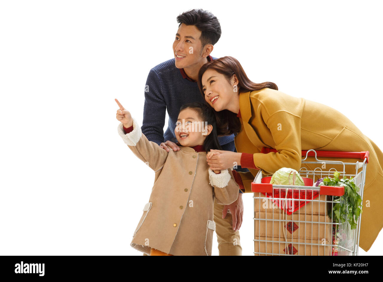 Happy family shopping Stock Photo - Alamy