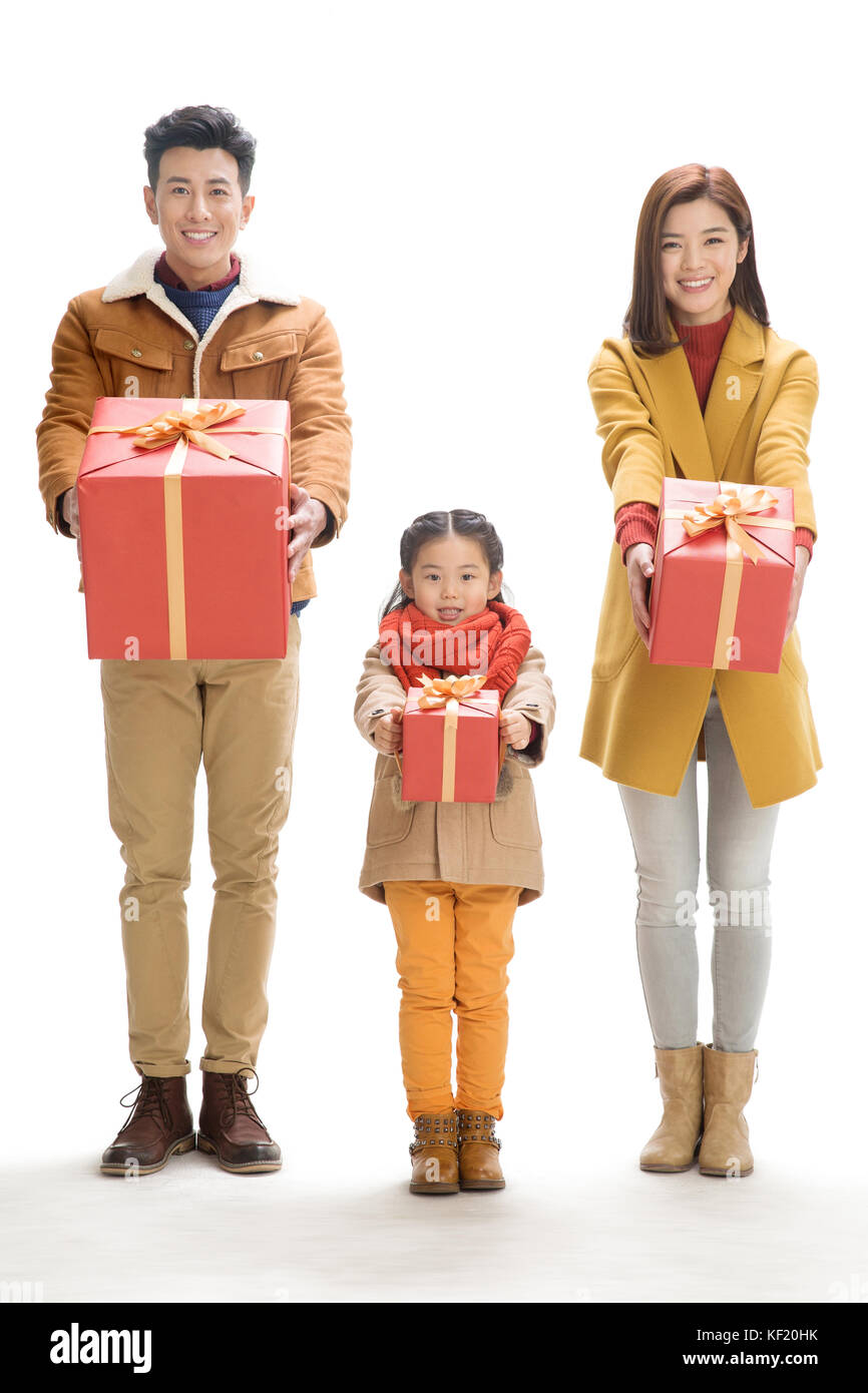 Happy family with presents Stock Photo - Alamy