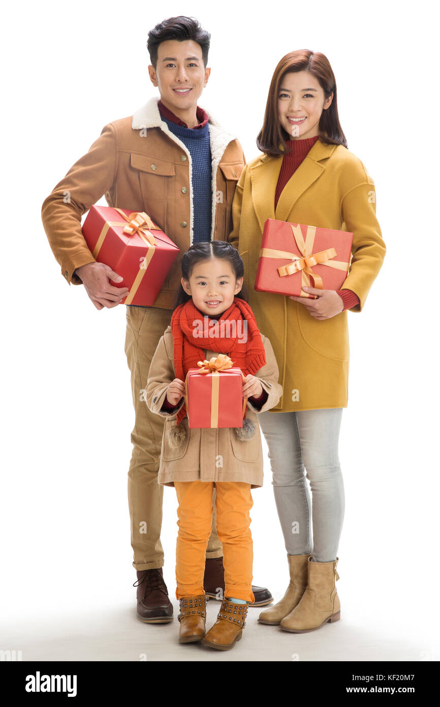 Happy family with presents Stock Photo - Alamy