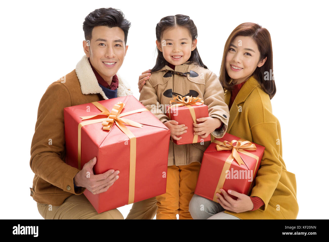 Happy family with presents Stock Photo - Alamy