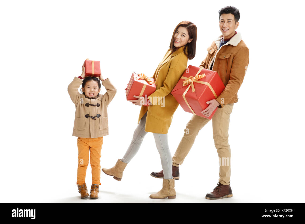 Happy family with presents Stock Photo - Alamy