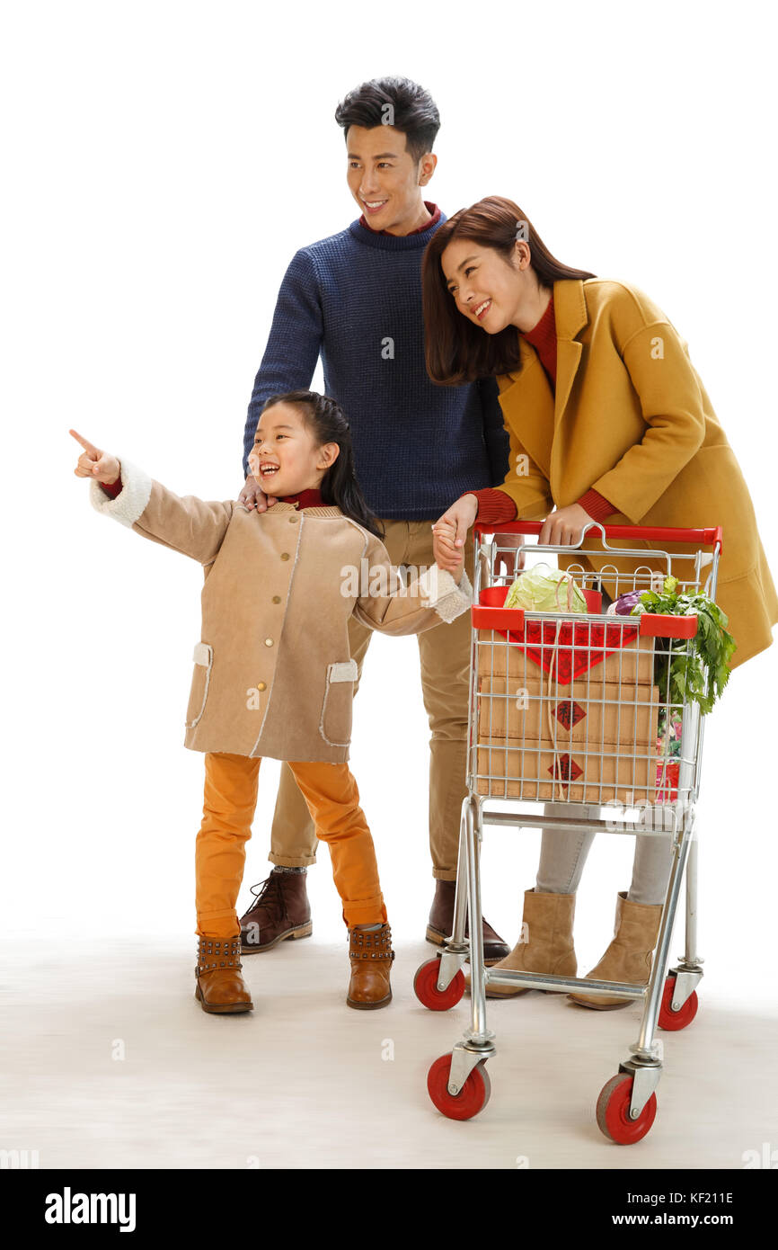 Happy family shopping Stock Photo - Alamy