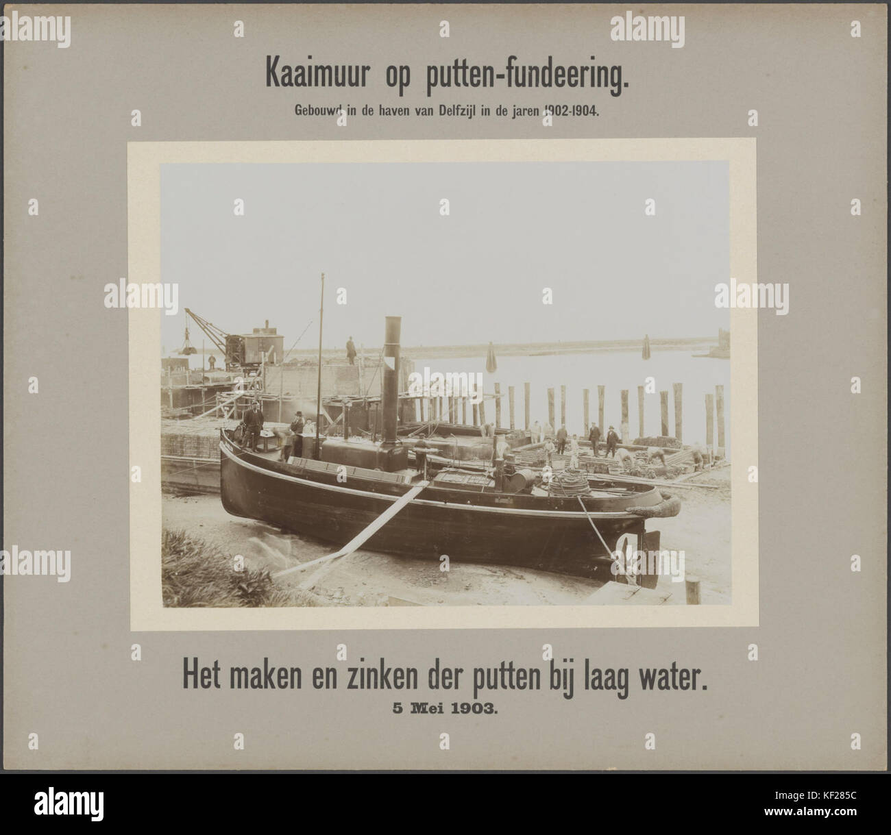 Het maken en zinken der putten bij laag water Stock Photo - Alamy