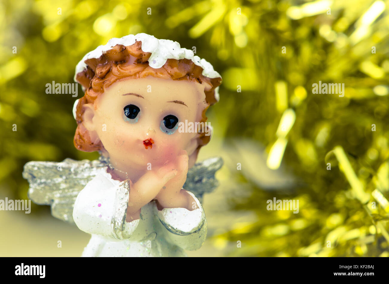 innocent angel with playing gesture Stock Photo - Alamy