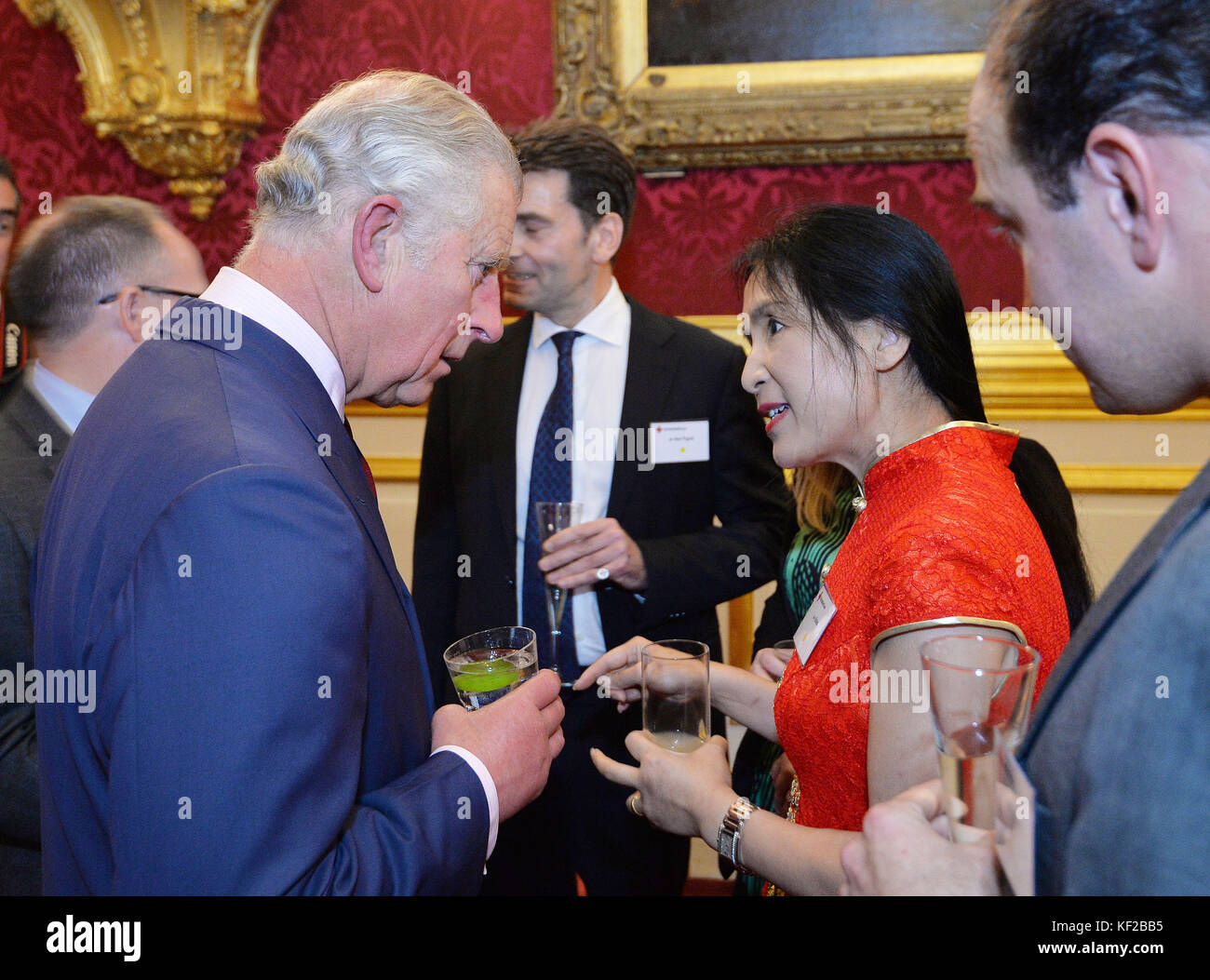 The Prince of Wales talks to Lady Bates at a reception for British Red ...