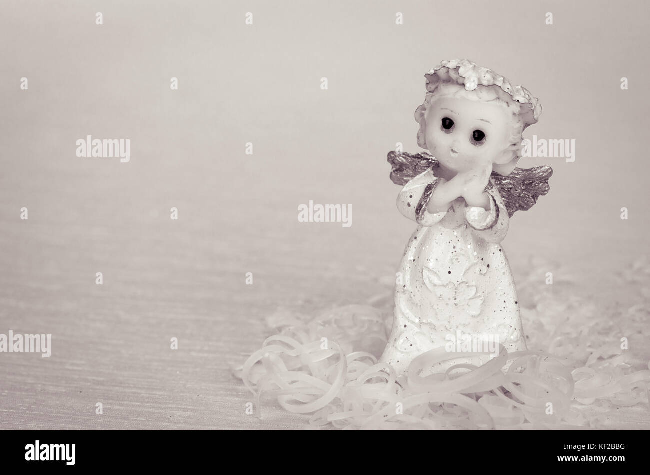 innocent angel with playing gesture Stock Photo - Alamy