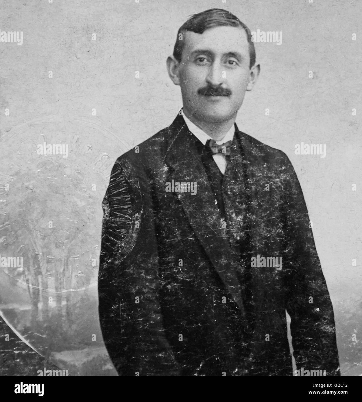 This portrait features a man with a moustache, captured in a formal ...