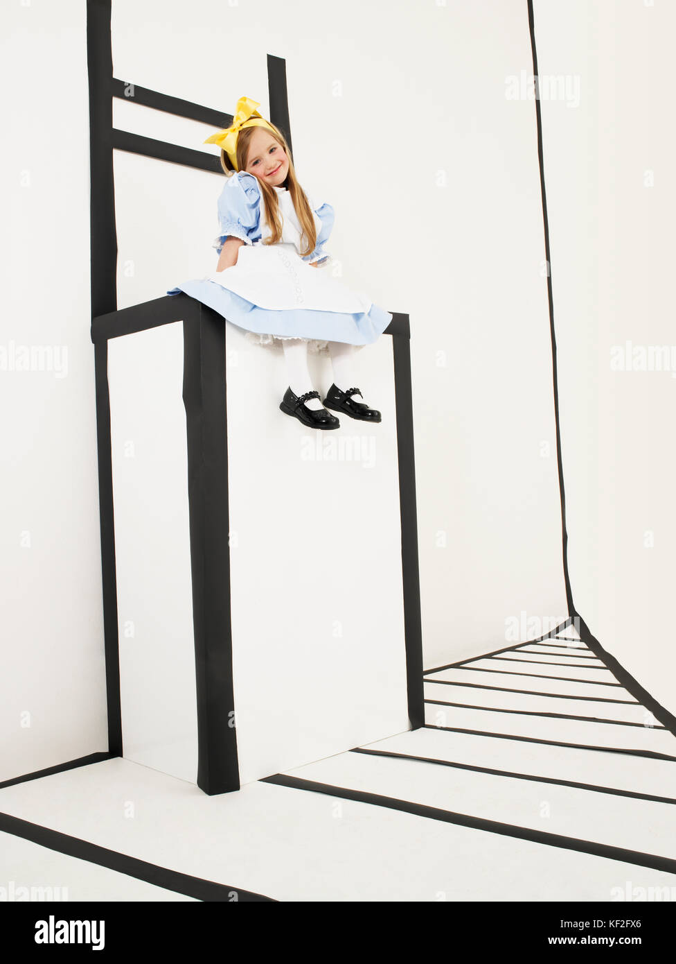 Alice sitting on hi-res stock photography and images - Alamy