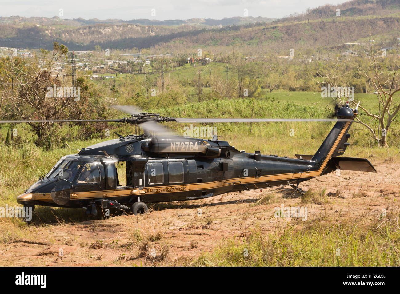 A U.S. Customs and Border Protection Black Hawk helicopter lands in a ...