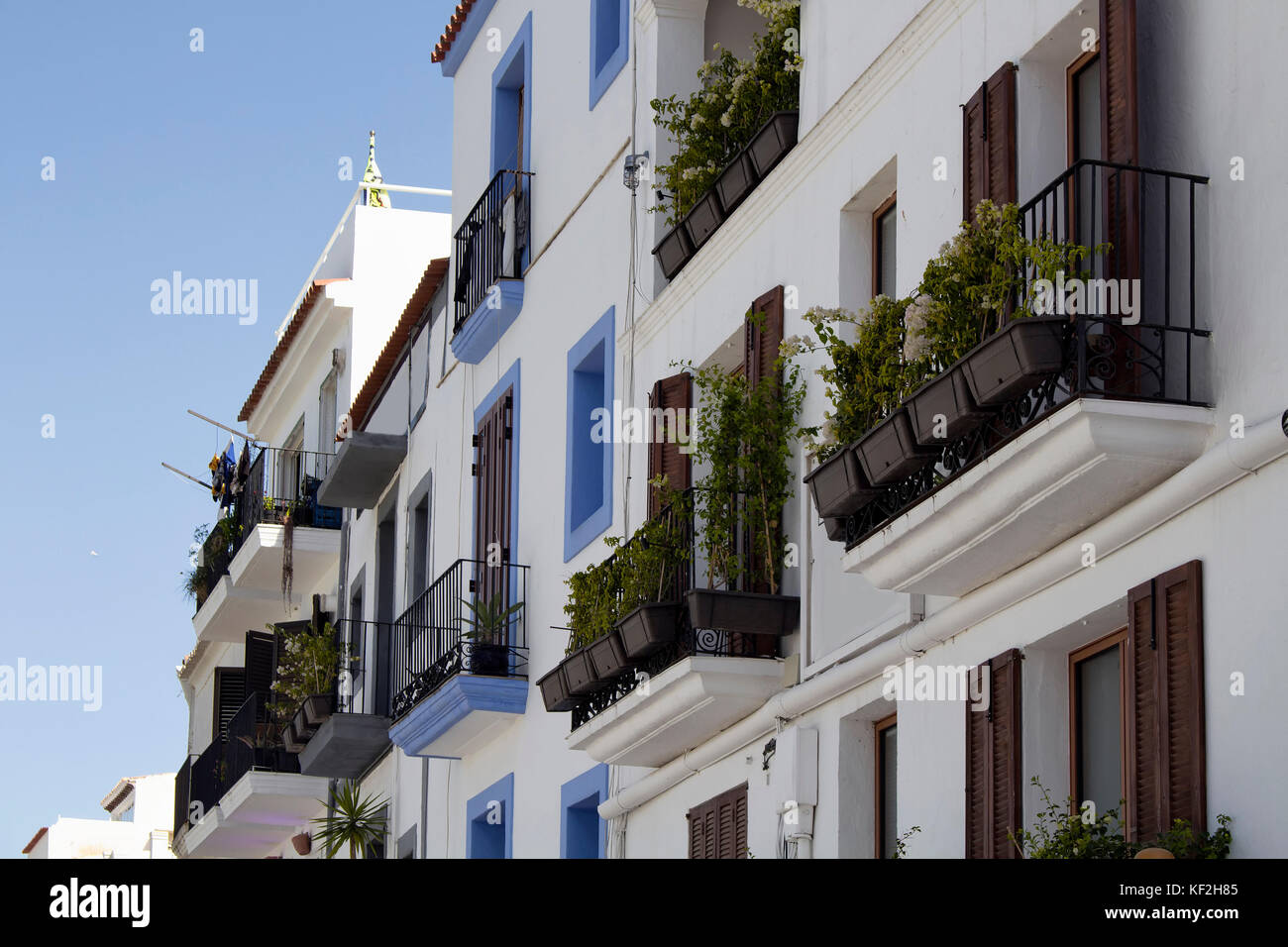 View of traditional, white, typical buildings in Ibiza. The image ...