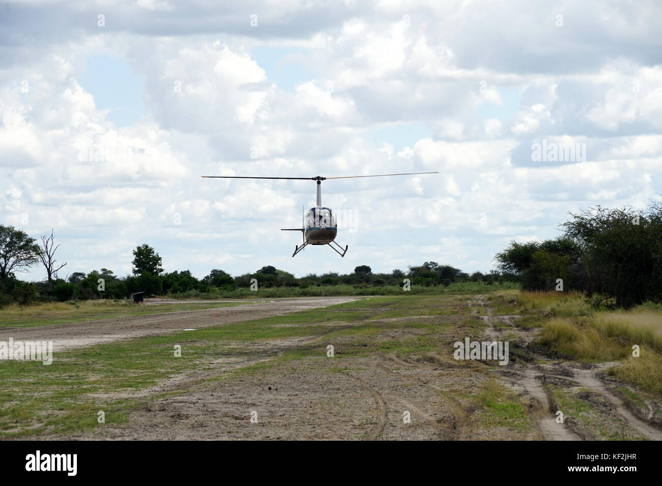 Helicopter taking off in Africa Stock Photo - Alamy