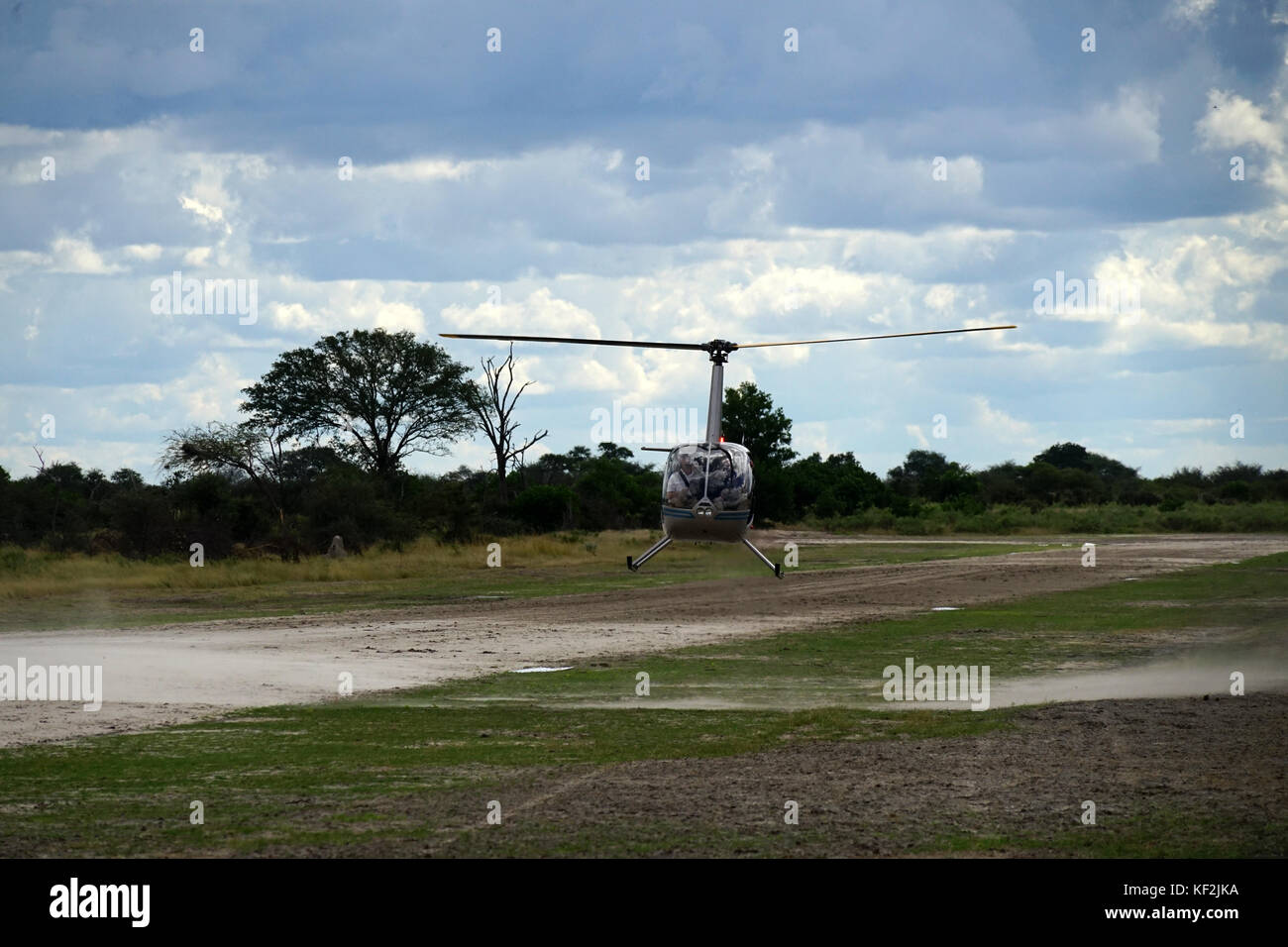 Helicopter taking off in Africa Stock Photo - Alamy