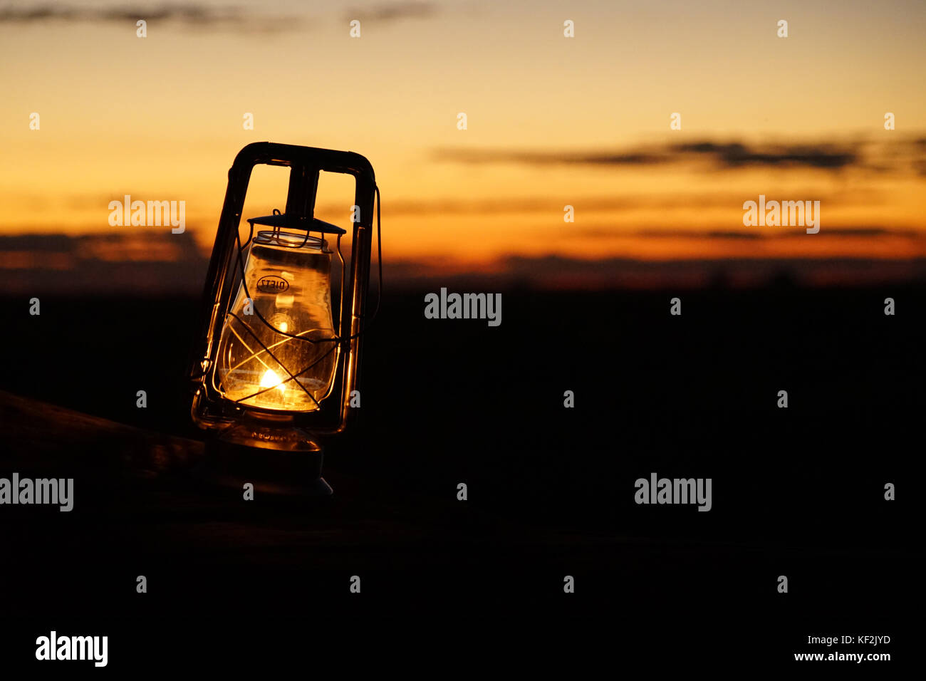 Lantern and Sunset in Africa Stock Photo - Alamy