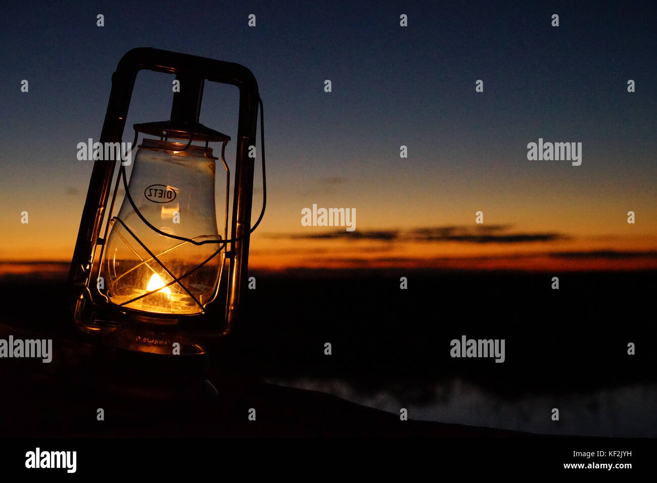 Lantern and Sunset in Africa Stock Photo - Alamy