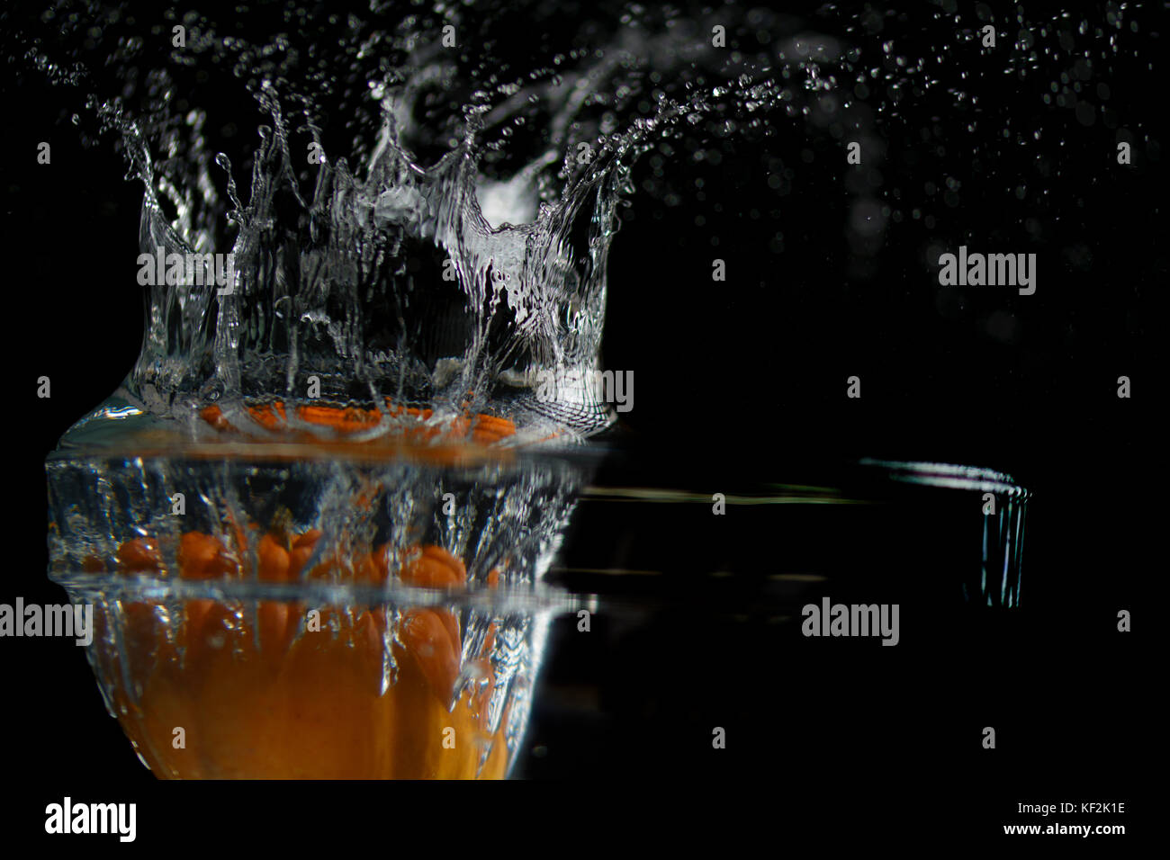 water splash, pumpkin falling in water and making a splash Stock Photo ...