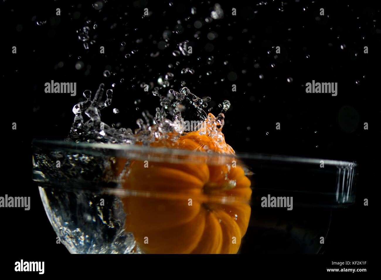 water splash, pumpkin falling in water and making a splash Stock Photo ...