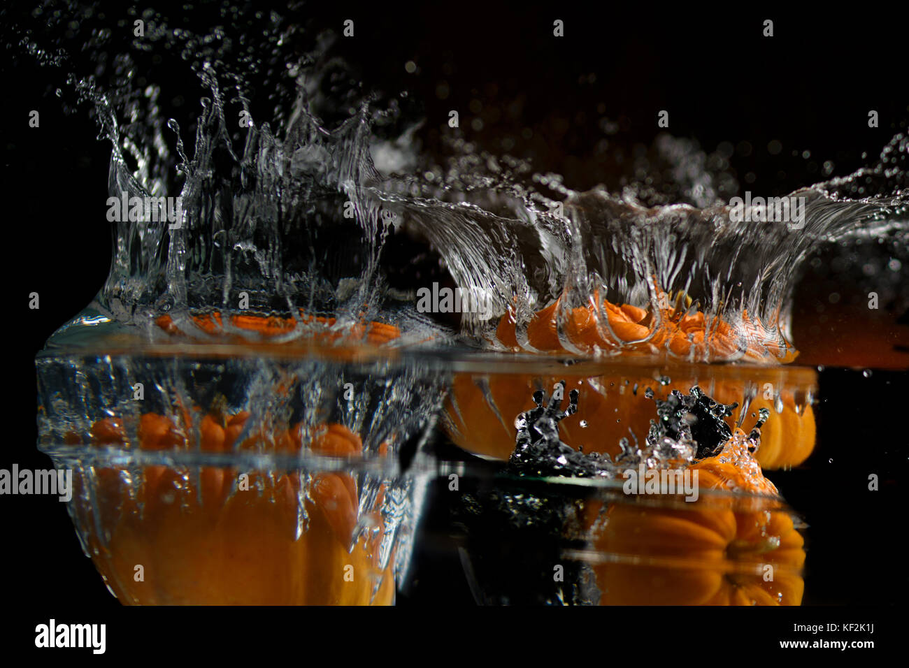 water splash, pumpkin falling in water and making a splash Stock Photo ...