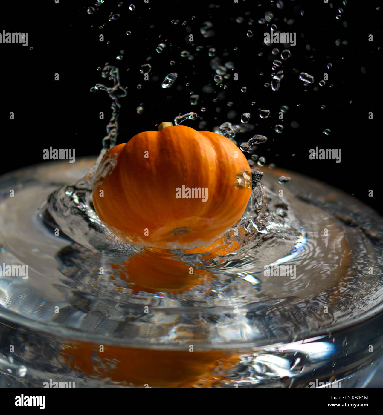 water splash, pumpkin falling in water and making a splash Stock Photo ...