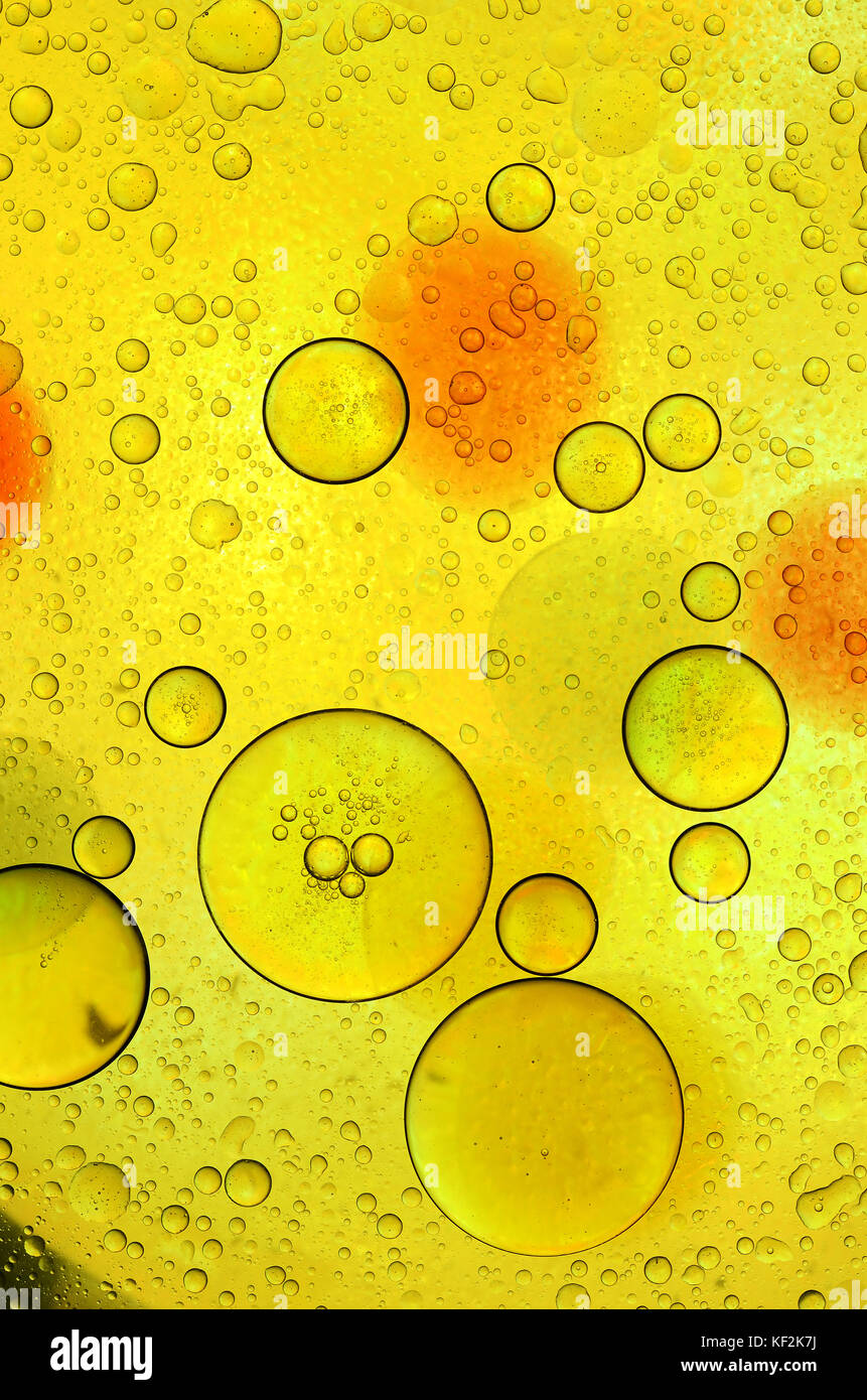 oil drops on water Stock Photo - Alamy