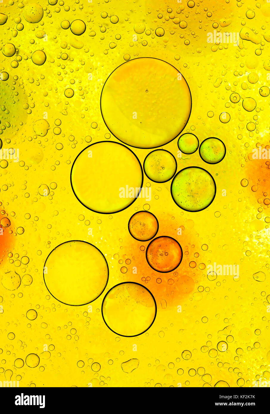 oil drops on water Stock Photo - Alamy