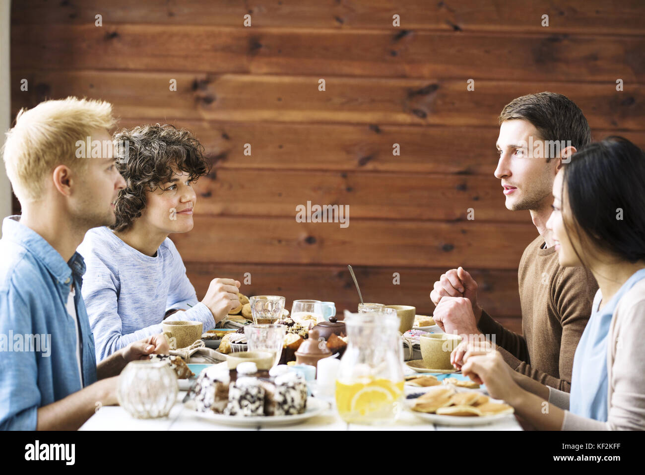 Talk by festive table Stock Photo - Alamy