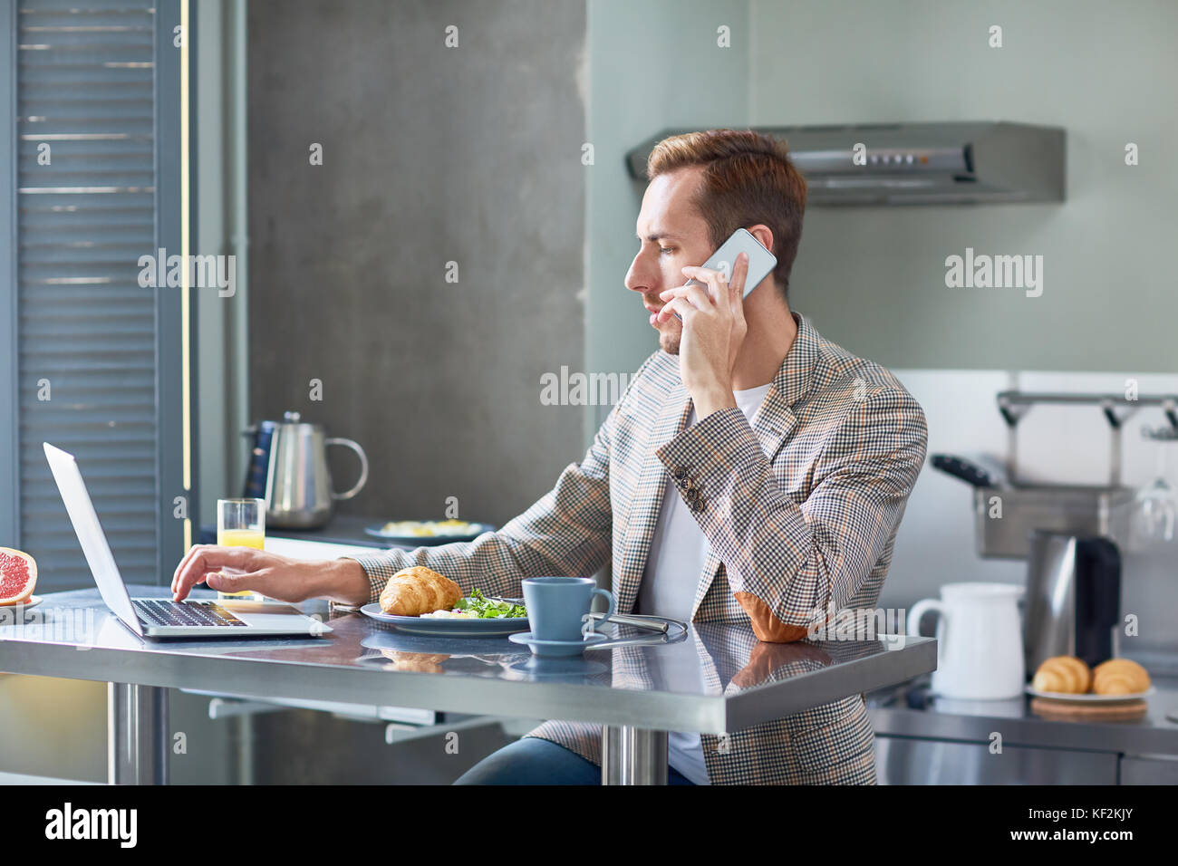 Working by lunch Stock Photo - Alamy