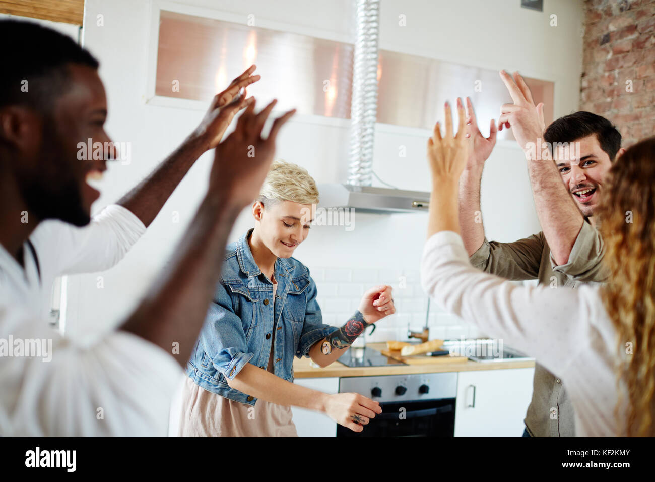 Dancing in the kitchen Stock Photo - Alamy