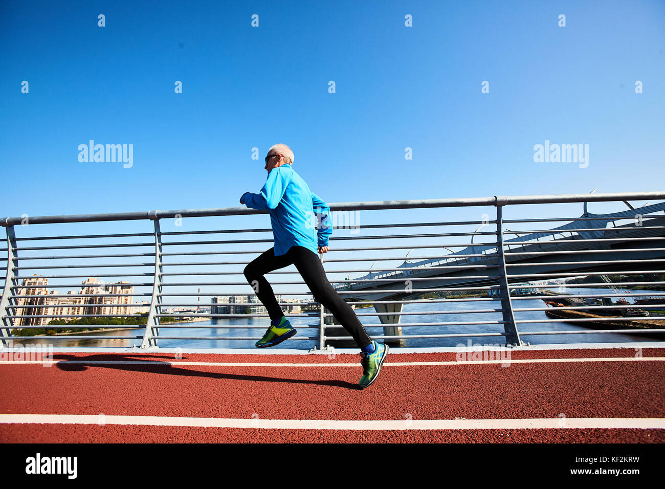 Running on Pedestrian Bridge Stock Photo - Alamy